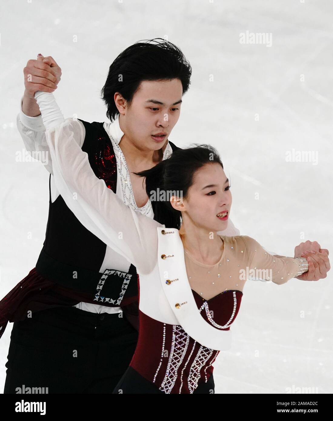 Lausanne, Switzerland. 12th Jan, 2020. Wang Yuchen (R)/Huang Yihang of ...