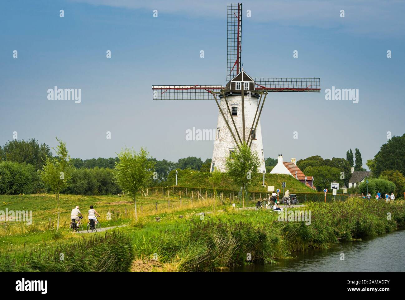 Landscape near the Belgian town of Damme with a typical windmill in the ...