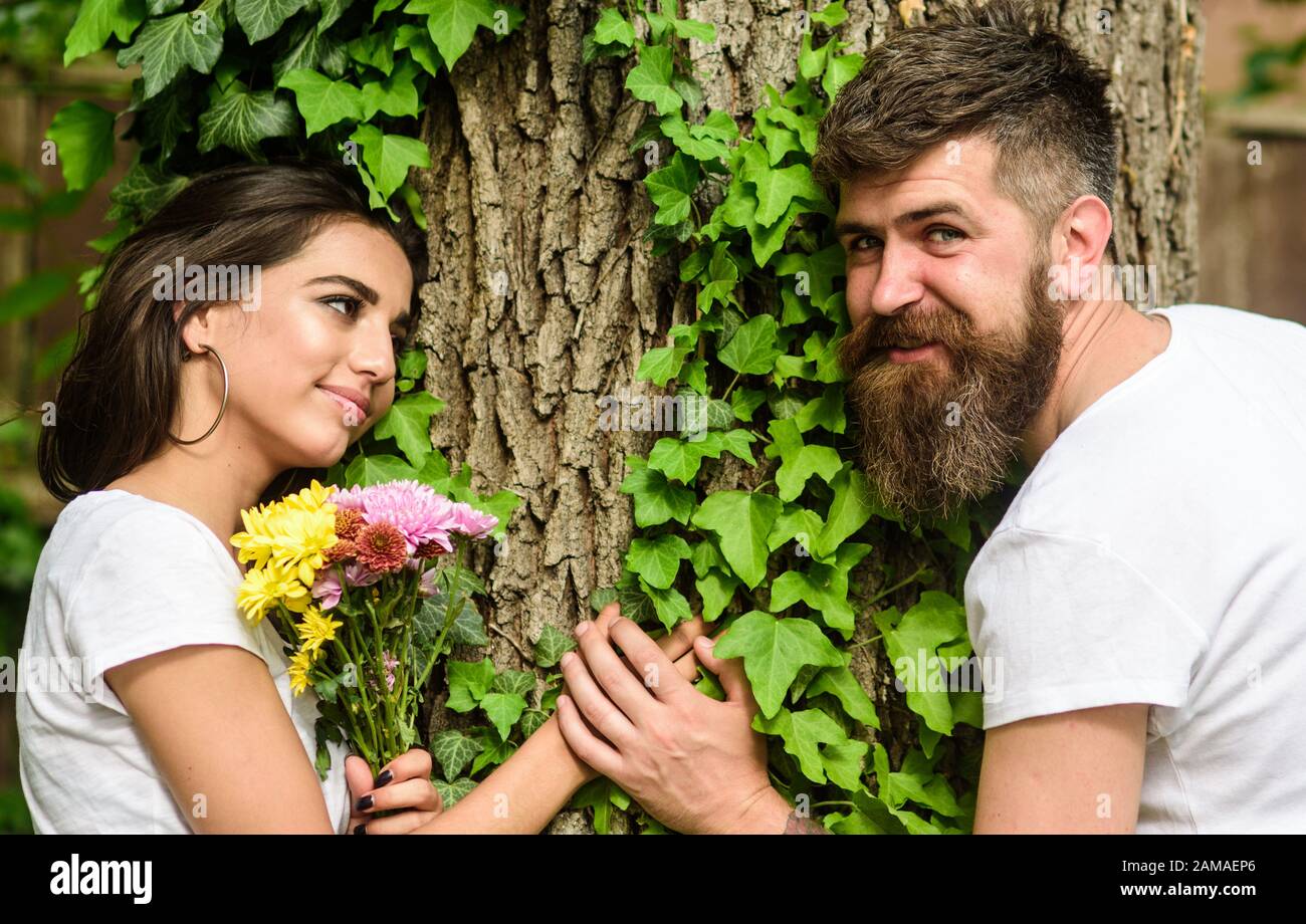 Man bearded hipster holds hand girlfriend. Couple in love romantic date ...