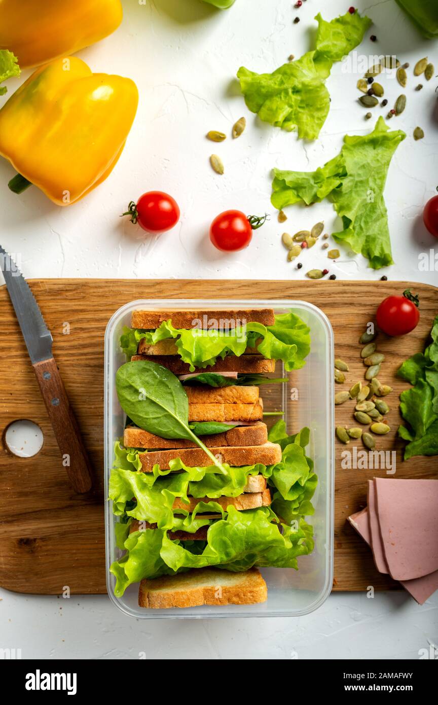 School lunch. Food Box with a delicious sandwich. Top view Stock Photo ...