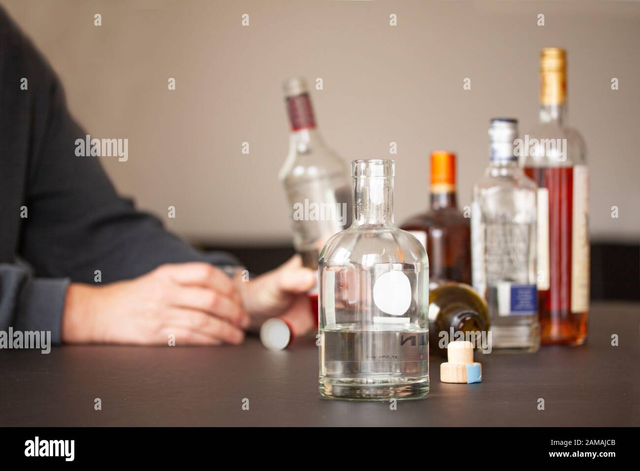 Empty alcohol bottle side hi-res stock photography and images - Alamy