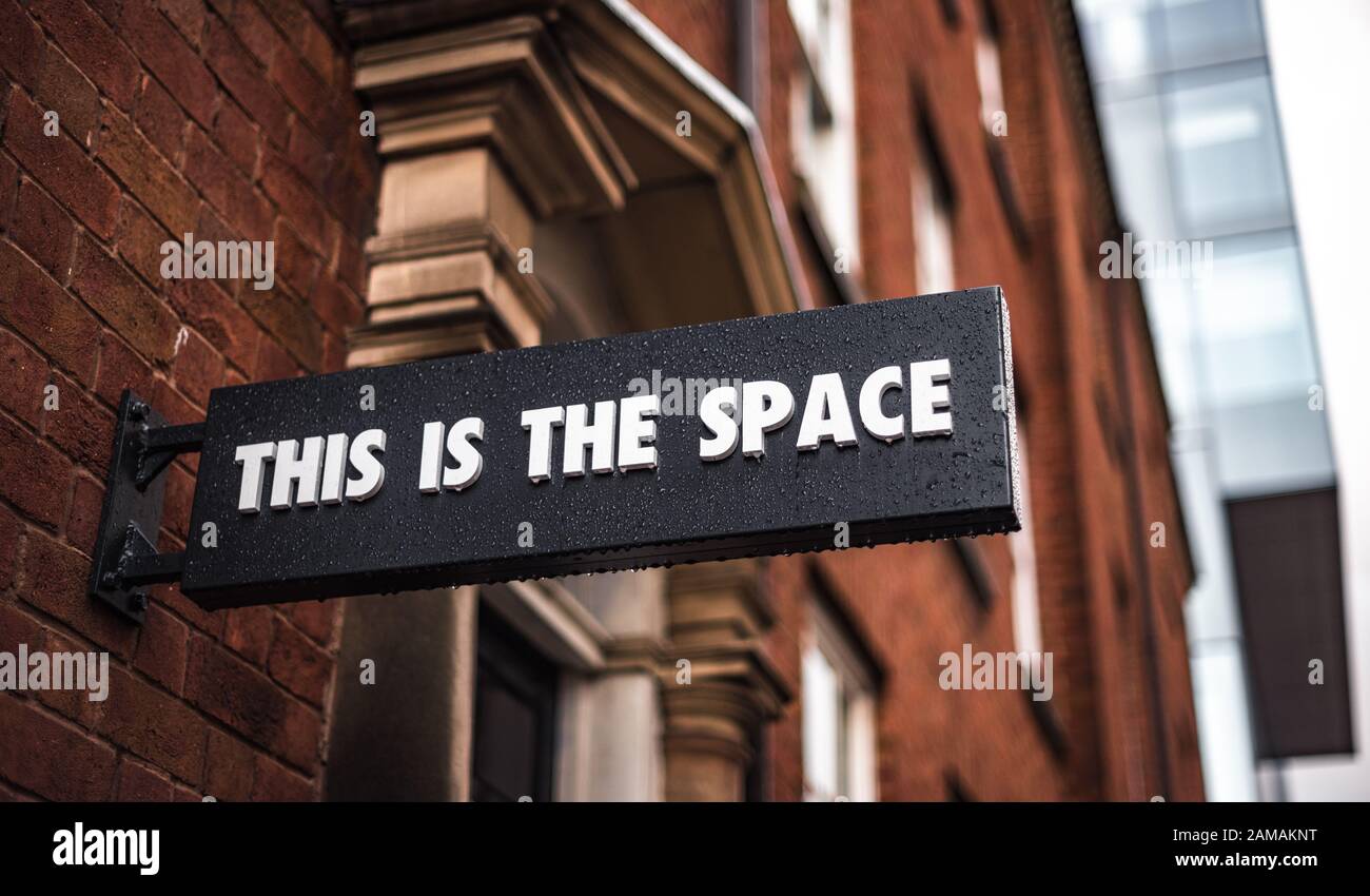 street brick red building in manchester UK city urban Stock Photo - Alamy