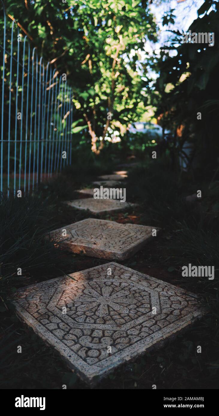 Stone slab pathway in garden Stock Photo - Alamy