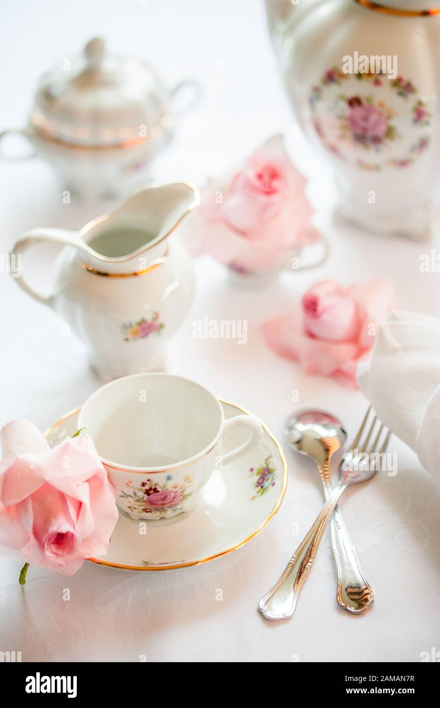 A set of floral rose pattern fine china porcelain tea set with a tea ...