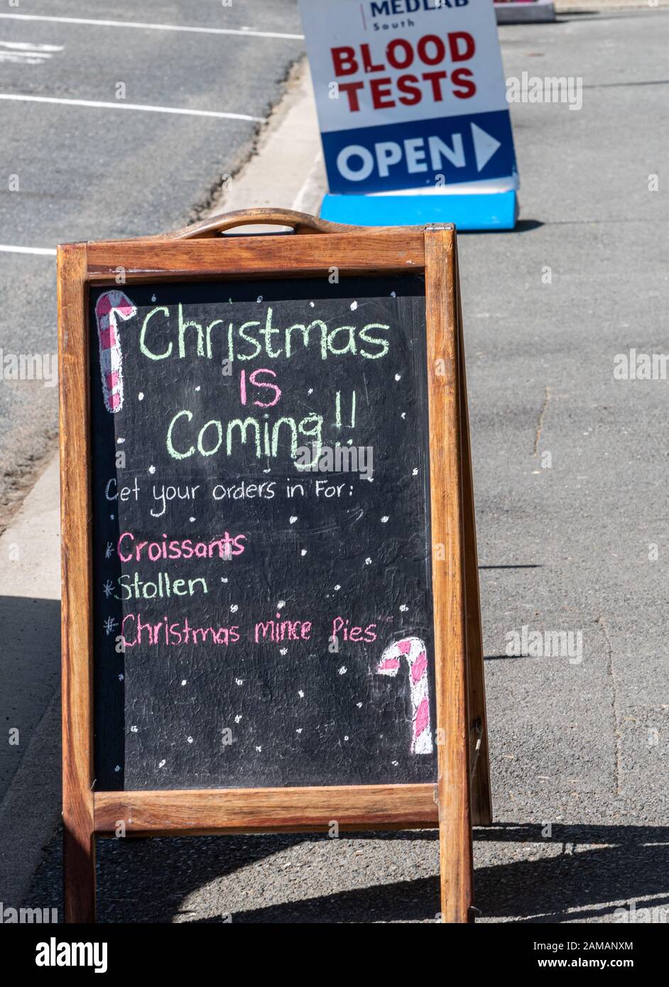 Blood tests and Christmas bakery sign, Motueka, New Zealand Stock Photo ...