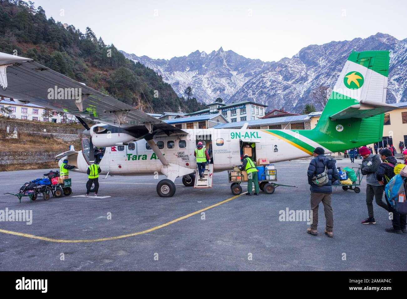 Tara Air plane on runway at Tenzing-Hillary airport at Lukla in the ...