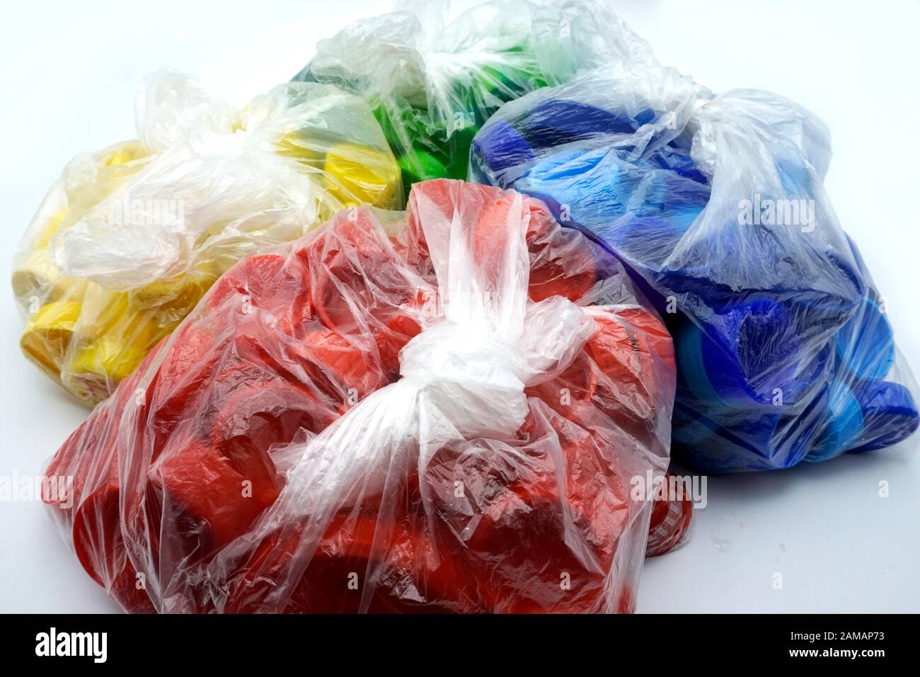 Colorful Plastic Bottle Caps Sorted By Colors In Transparent Single Use Plastic Bags PP An PET colorful-plastic-bottle-caps-sorted-by-colors-in-transparent-single-use-plastic-bags-pp-an-pet