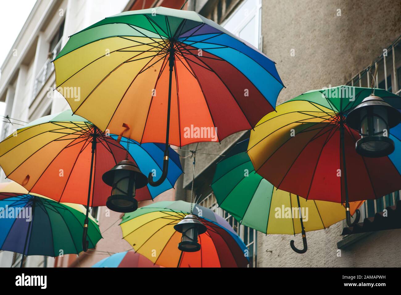 Multi-colored umbrellas hang overhead on a street in Istanbul in Turkey ...