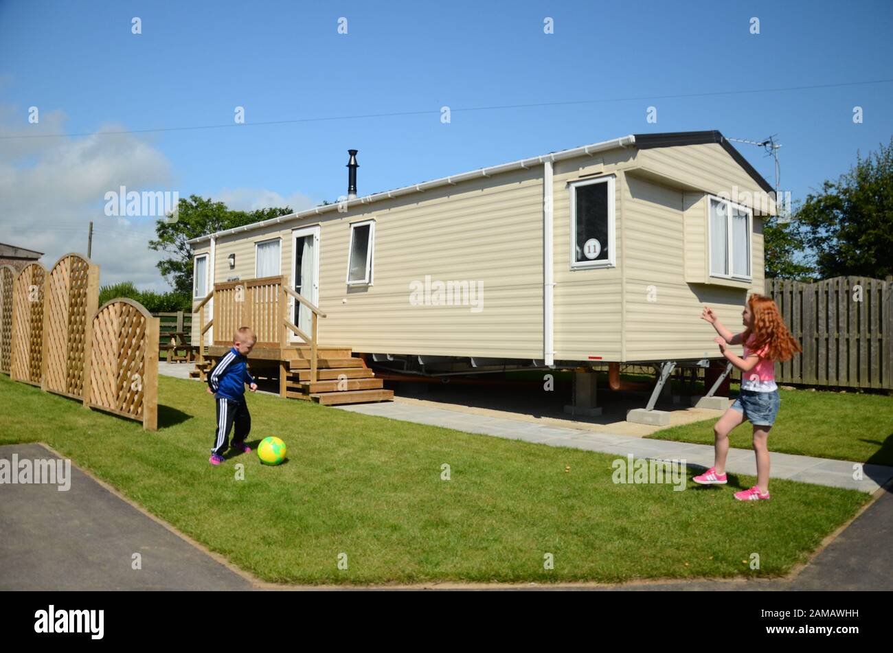 Caravan park holiday cottages hi-res stock photography and images - Alamy