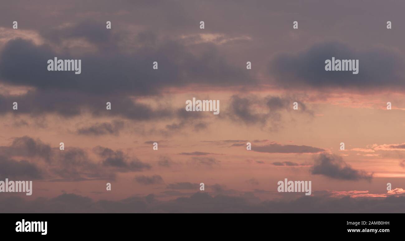 summer sunset skyscape with moving clouds, wide photo Stock Photo - Alamy