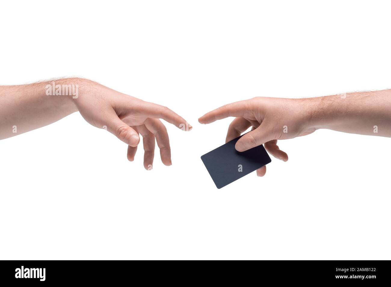 Two male hands passing one another a black plastic discount or credit ...