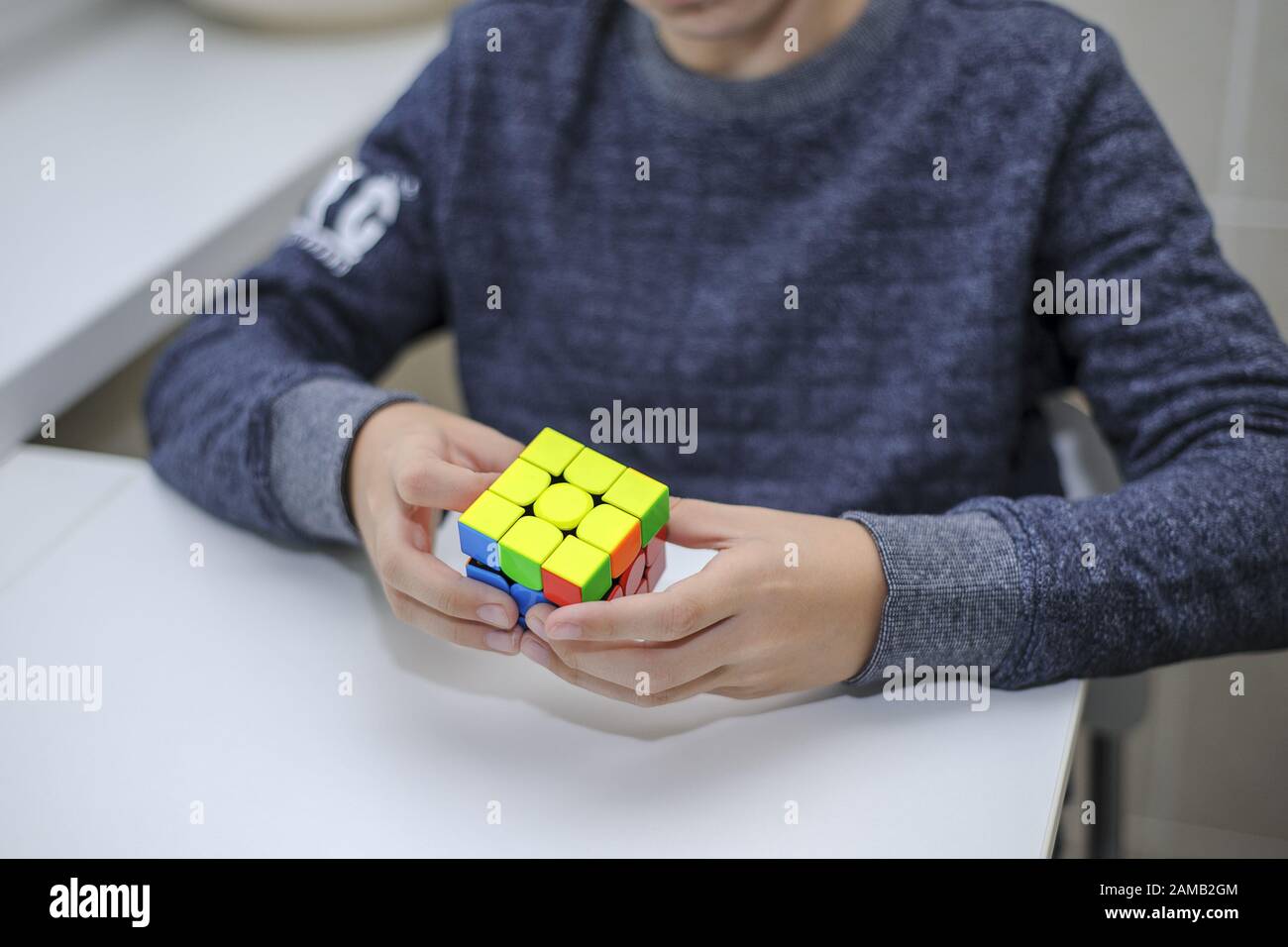 Rubiks cube child hi-res stock photography and images - Alamy