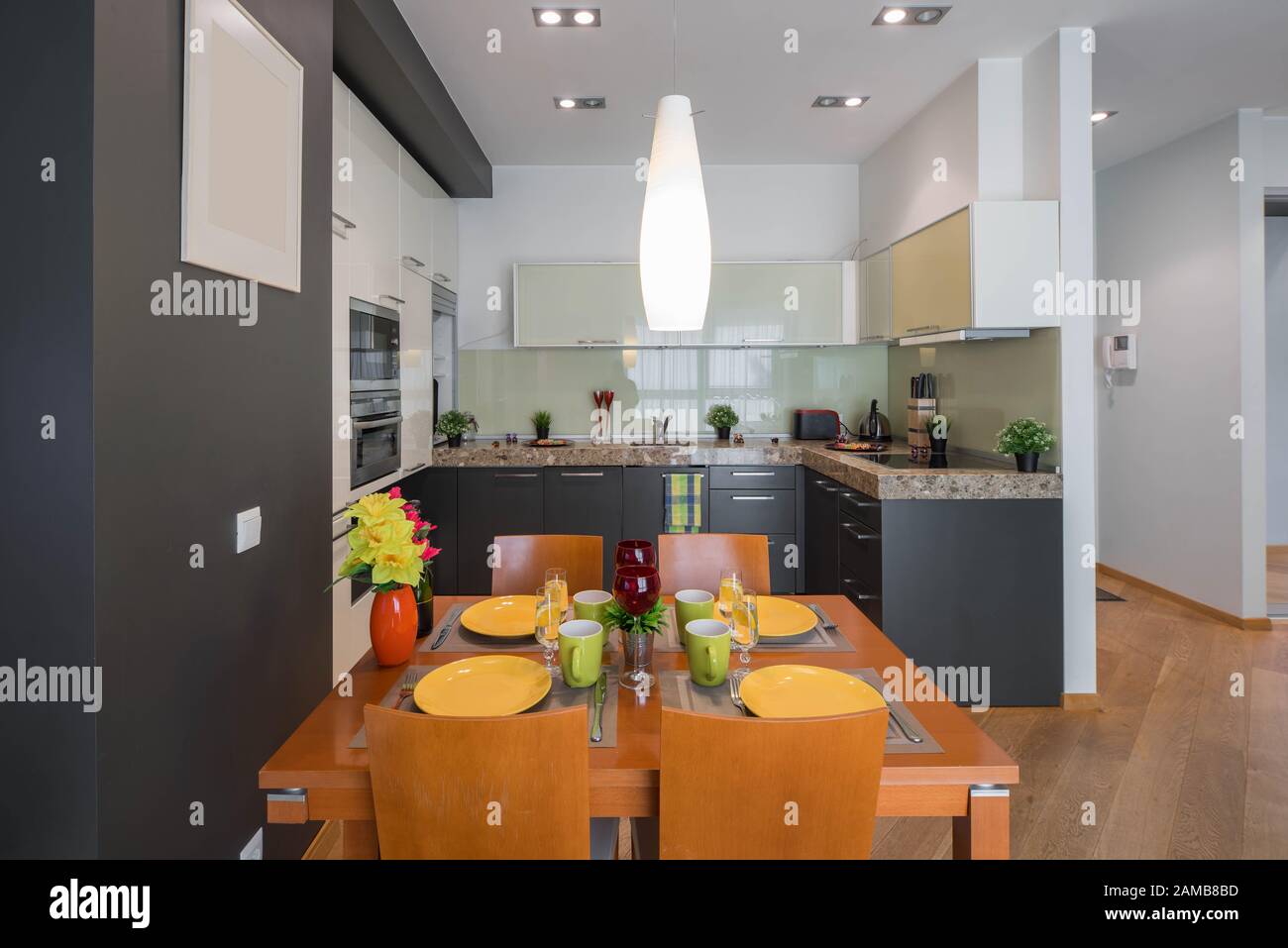 Modern interior of kitchen in studio apartment. Kitchen set. Chairs and ...