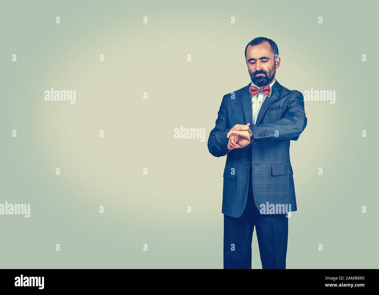 Businessman looking on his watch. Standing one single person man with ...