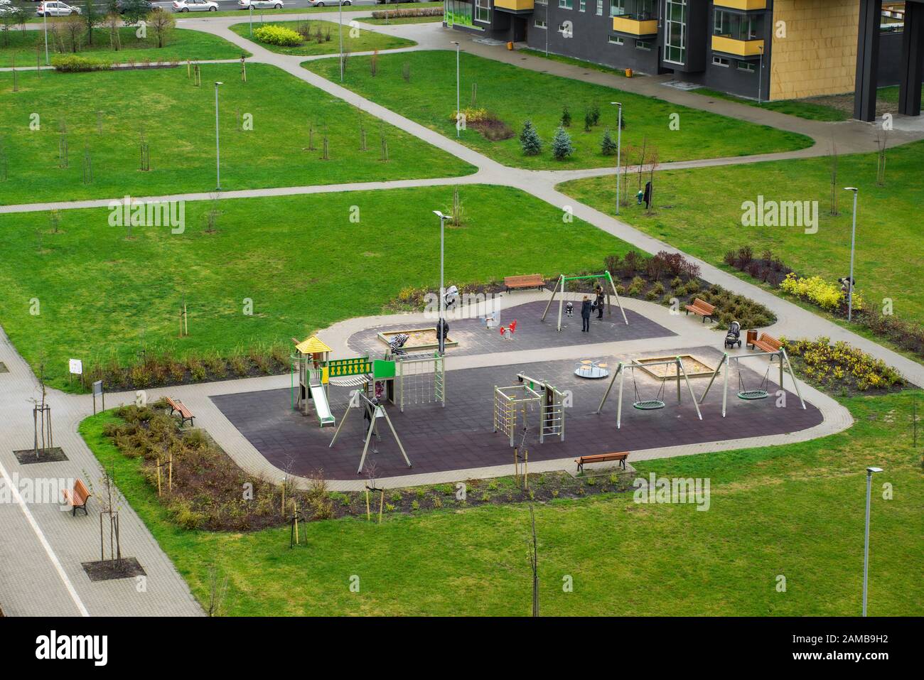 Top view of the modern playground in the courtyard of the residential ...