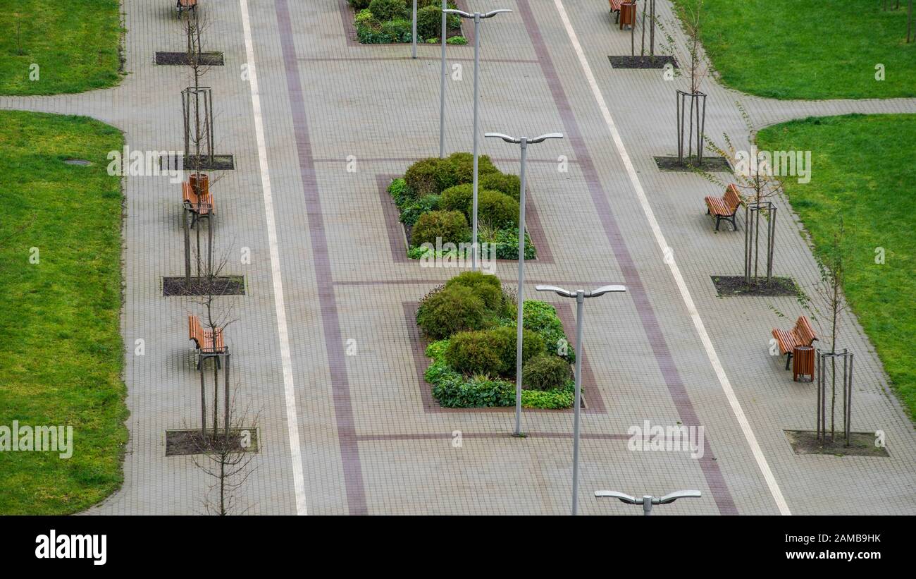 Top view of the modern pedestrian area. Cobblestones, benches and ...