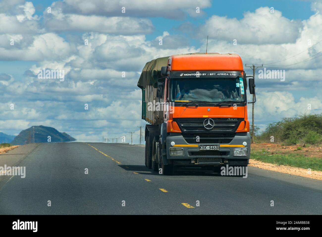 A large truck driving along Mombasa highway carrying goods, Kenya Stock ...