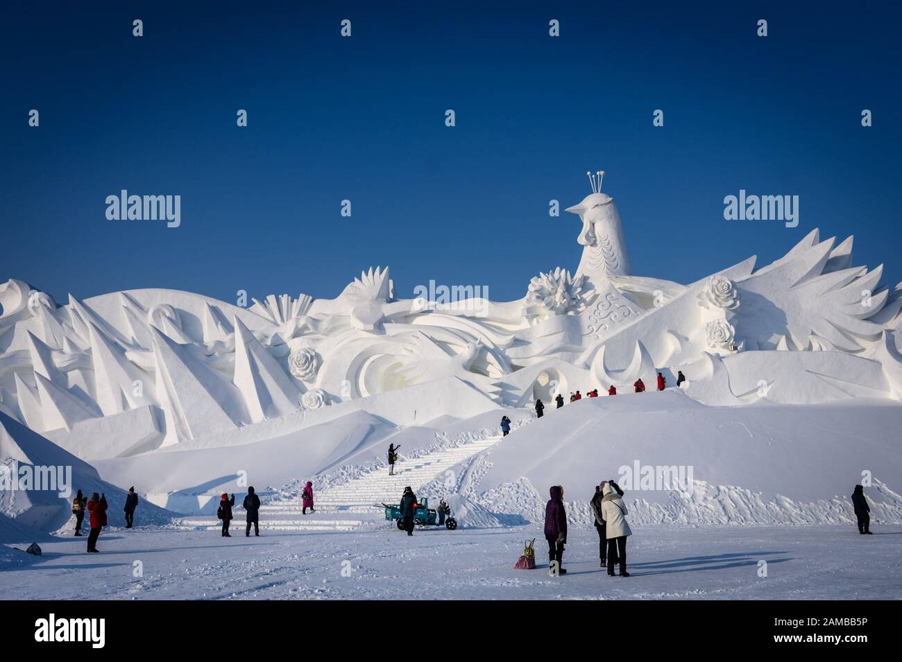 Tourists visit ice sculpture during the 36th Harbin Ice and Snow ...