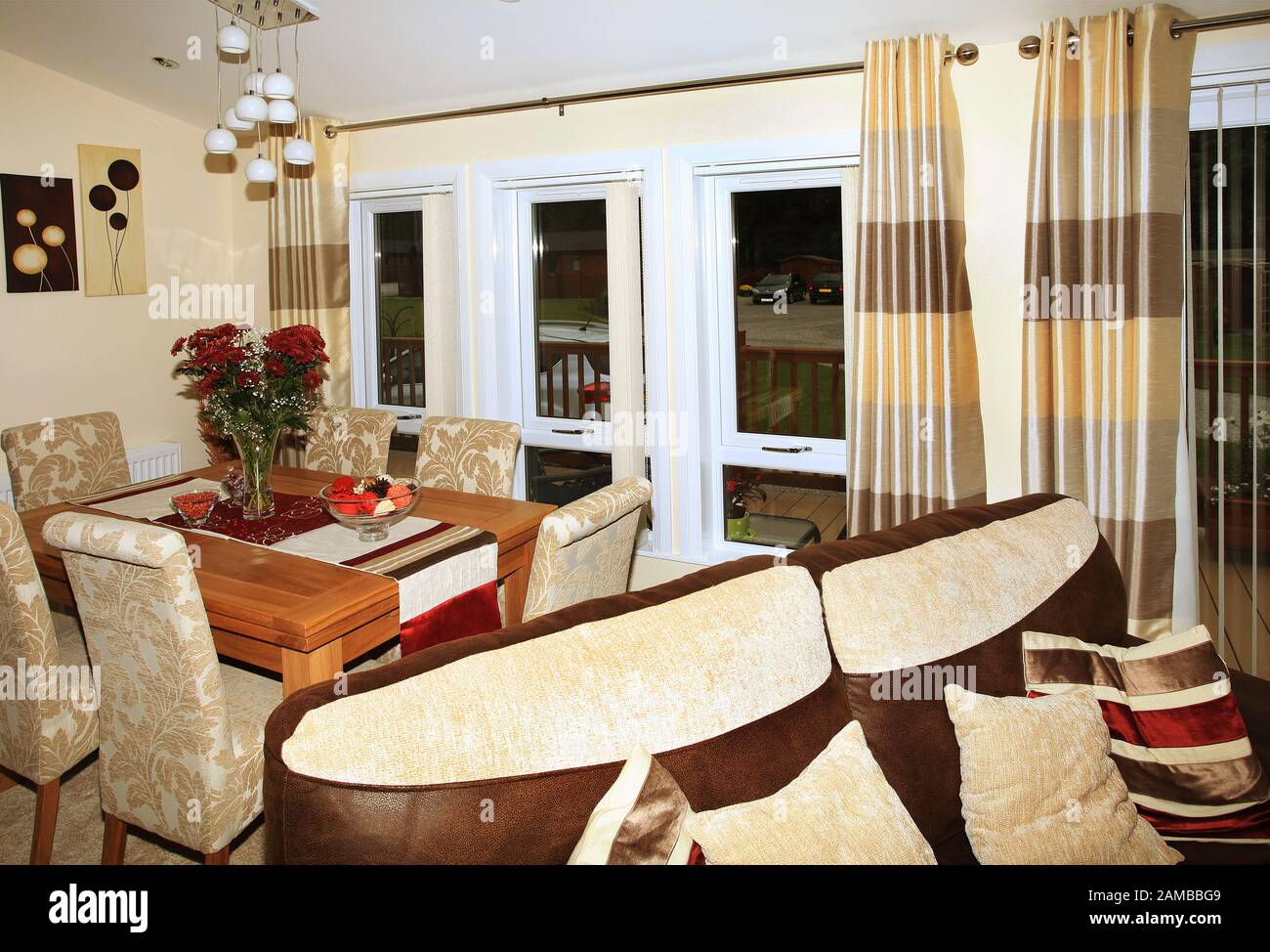 Luxury interior dining room of a Log Cabin style static caravan Stock ...