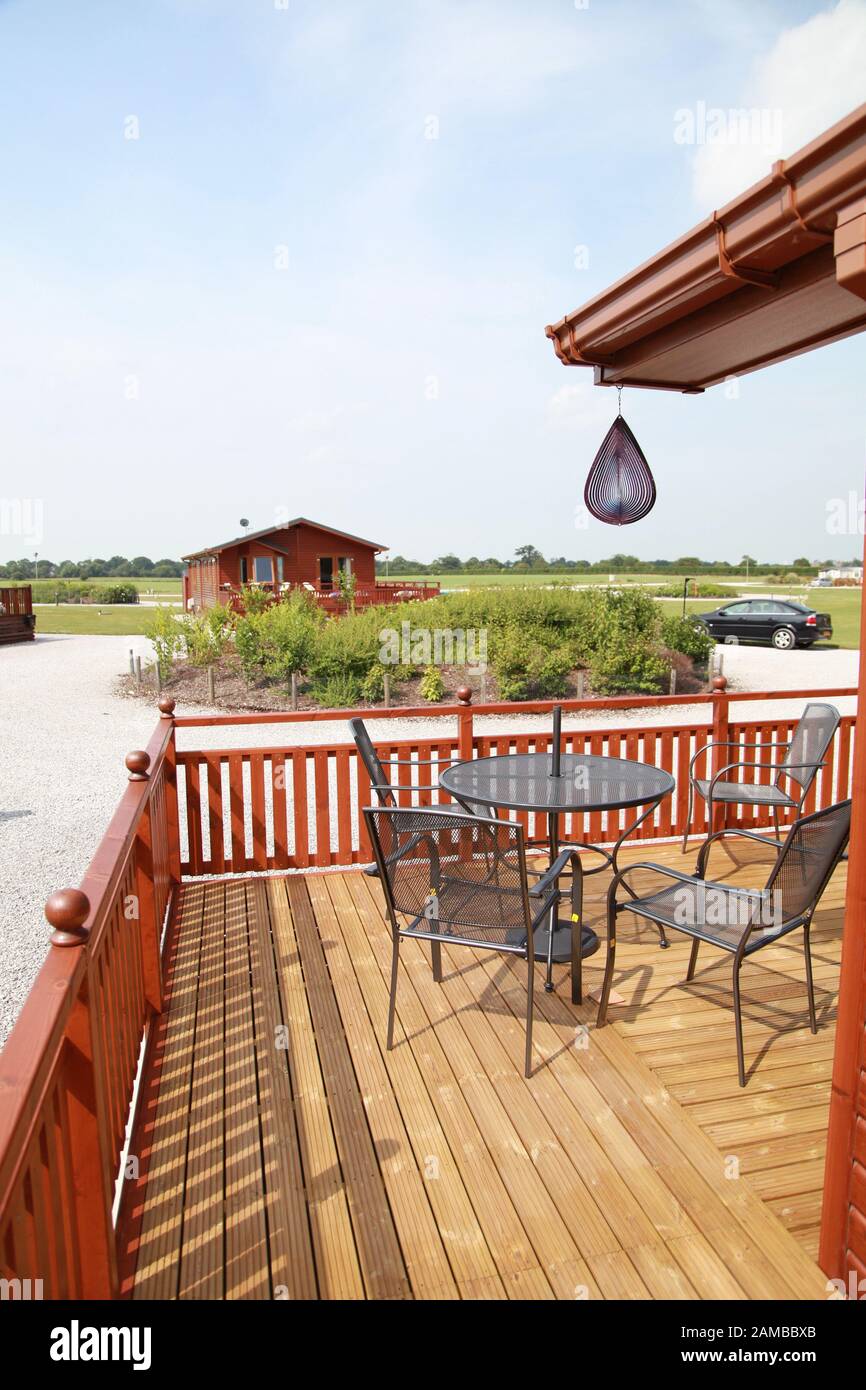 Log Cabin style static caravan Stock Photo - Alamy