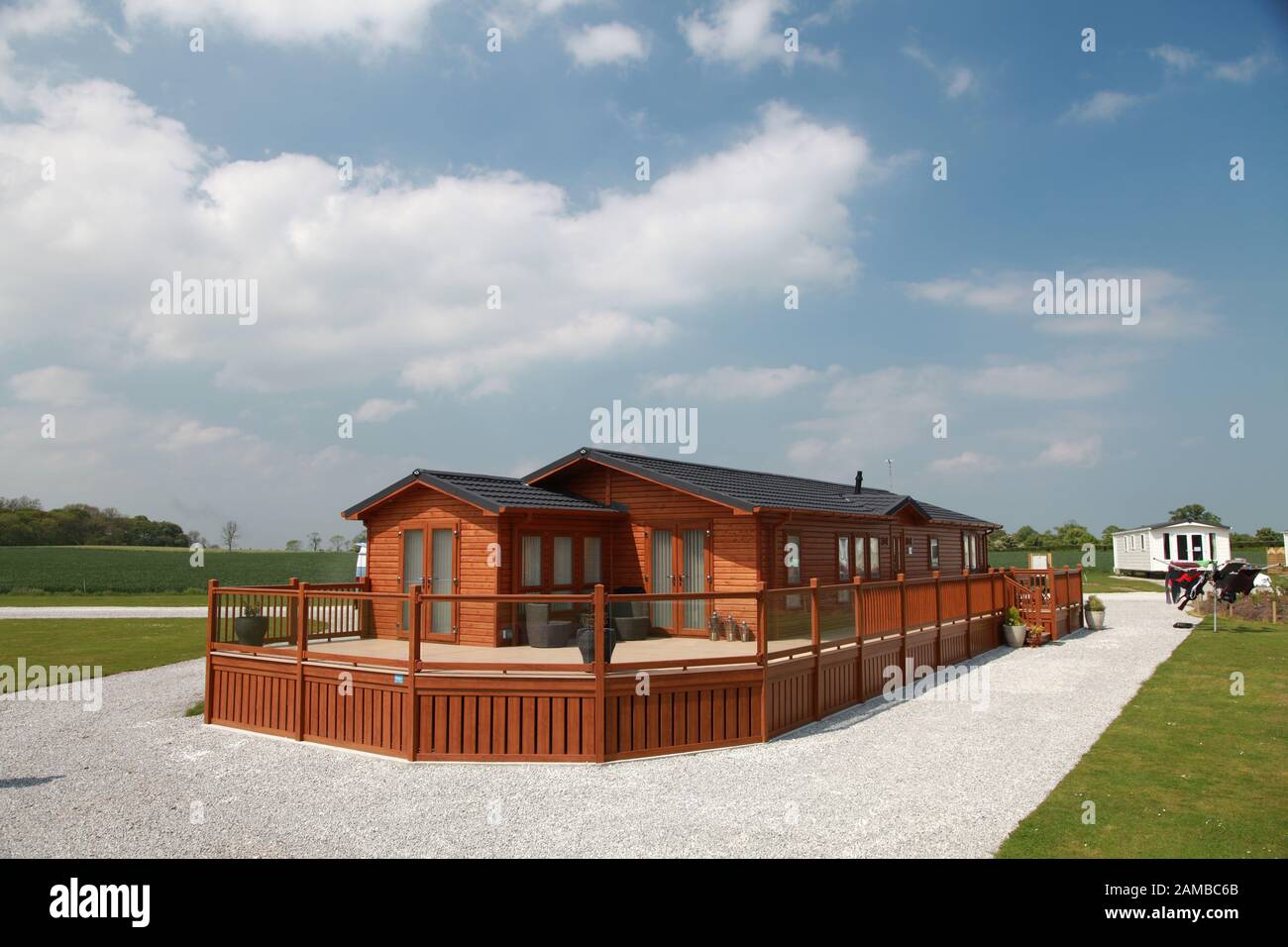 Log Cabin style static caravan Stock Photo - Alamy