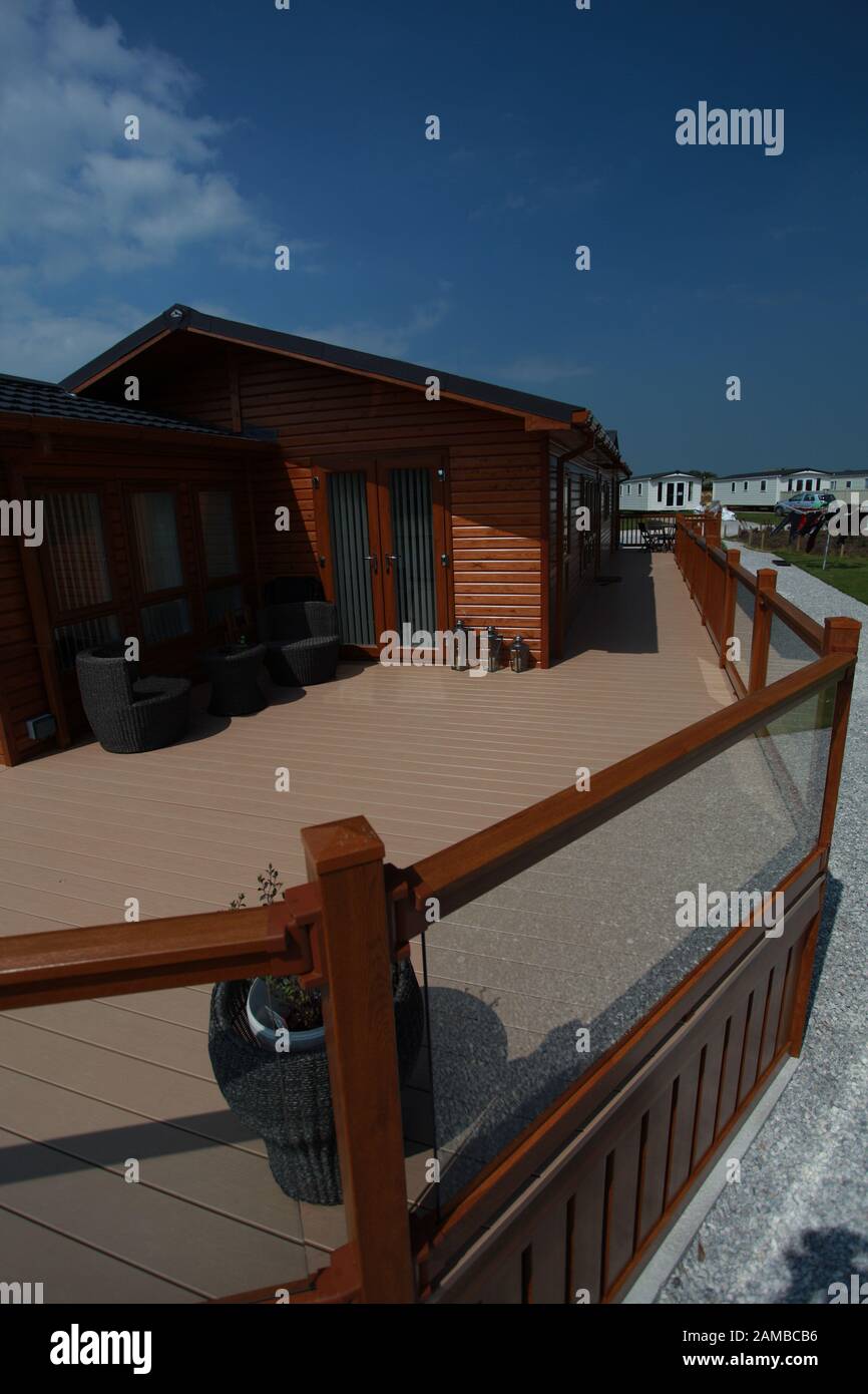 Log Cabin style static caravan Stock Photo - Alamy