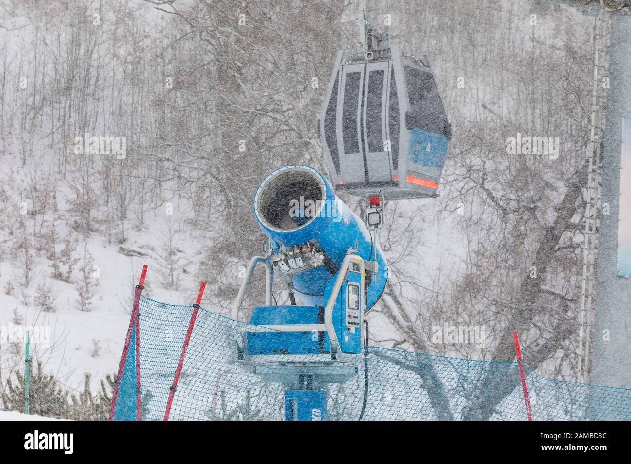 Gun for spraying snow on a ski run Stock Photo - Alamy