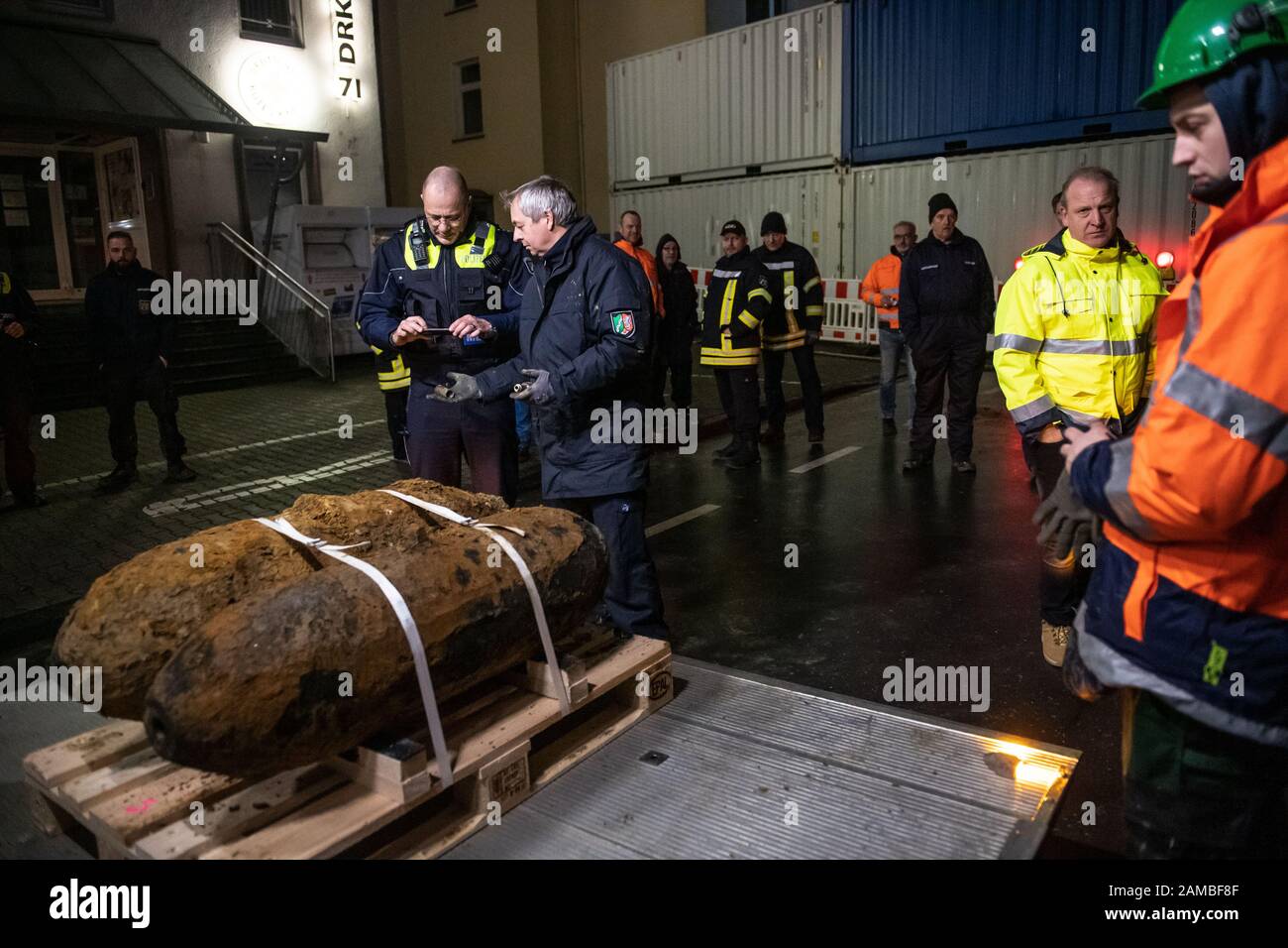 Dortmund, Germany. 12th Jan, 2020. Bomb squad members photograph the ...