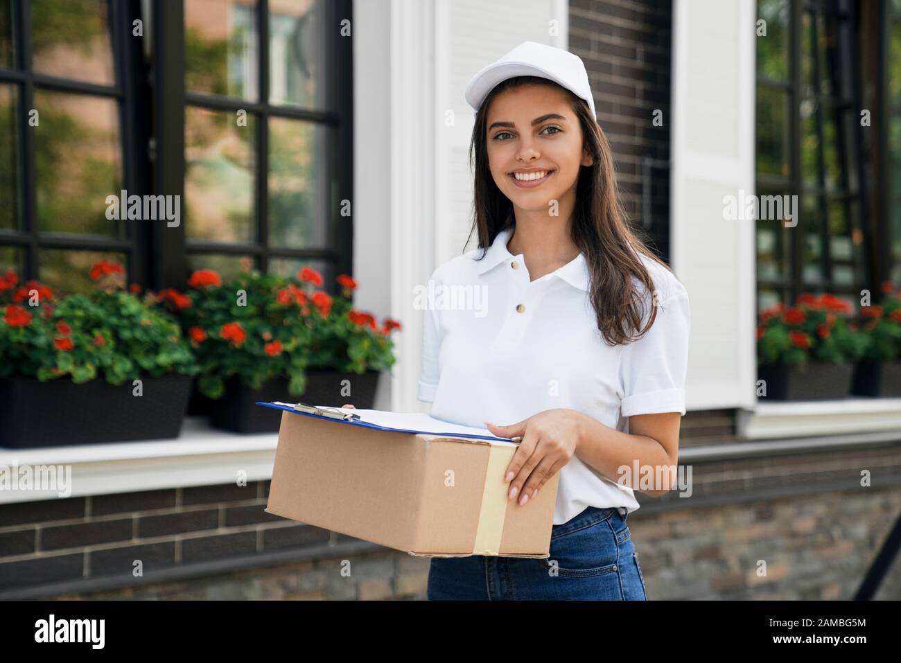Woman postman hi-res stock photography and images - Alamy