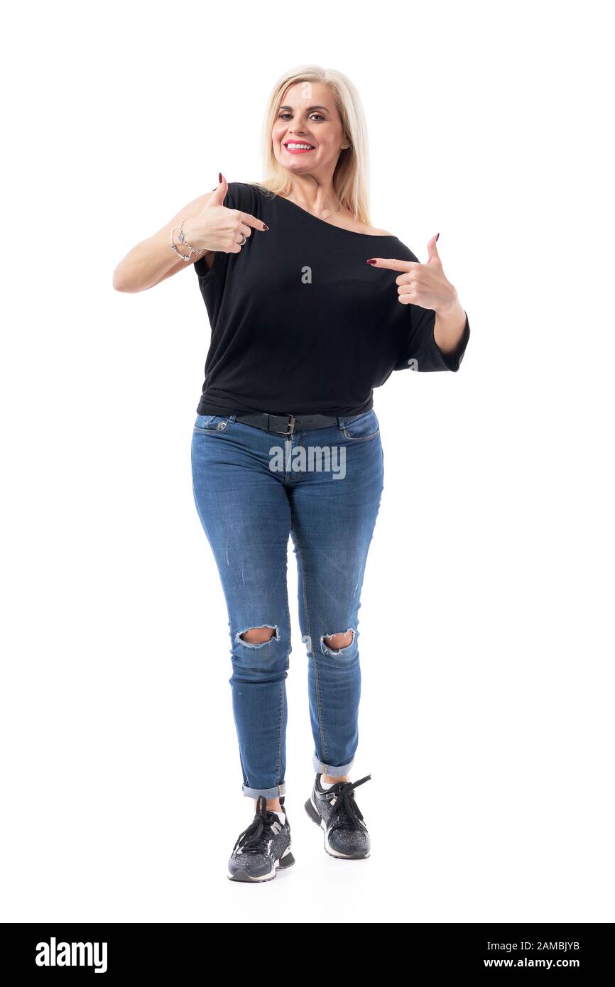 Confident middle age woman pointing Cut Out Stock Images & Pictures - Alamy
