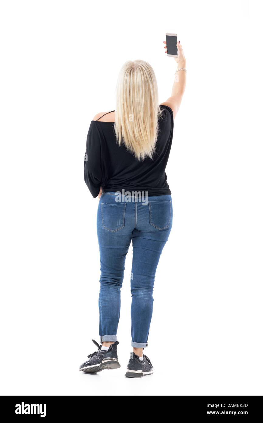 Woman taking off black female Cut Out Stock Images & Pictures - Alamy
