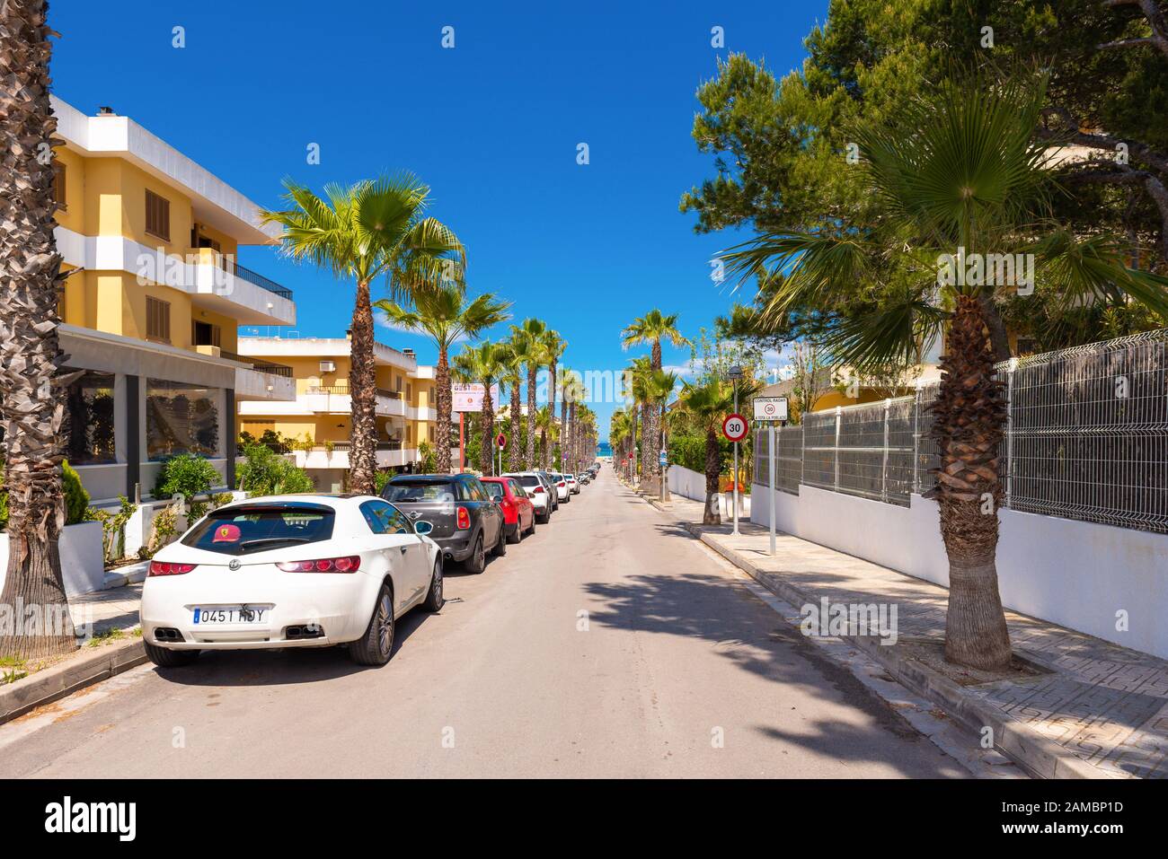 Can Picafort, Majorca - May 10, 2019: A beautiful street with palm ...