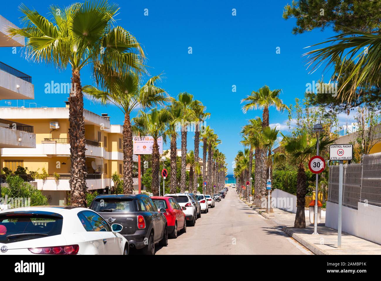 Can Picafort, Majorca - May 10, 2019: A beautiful street with palm ...