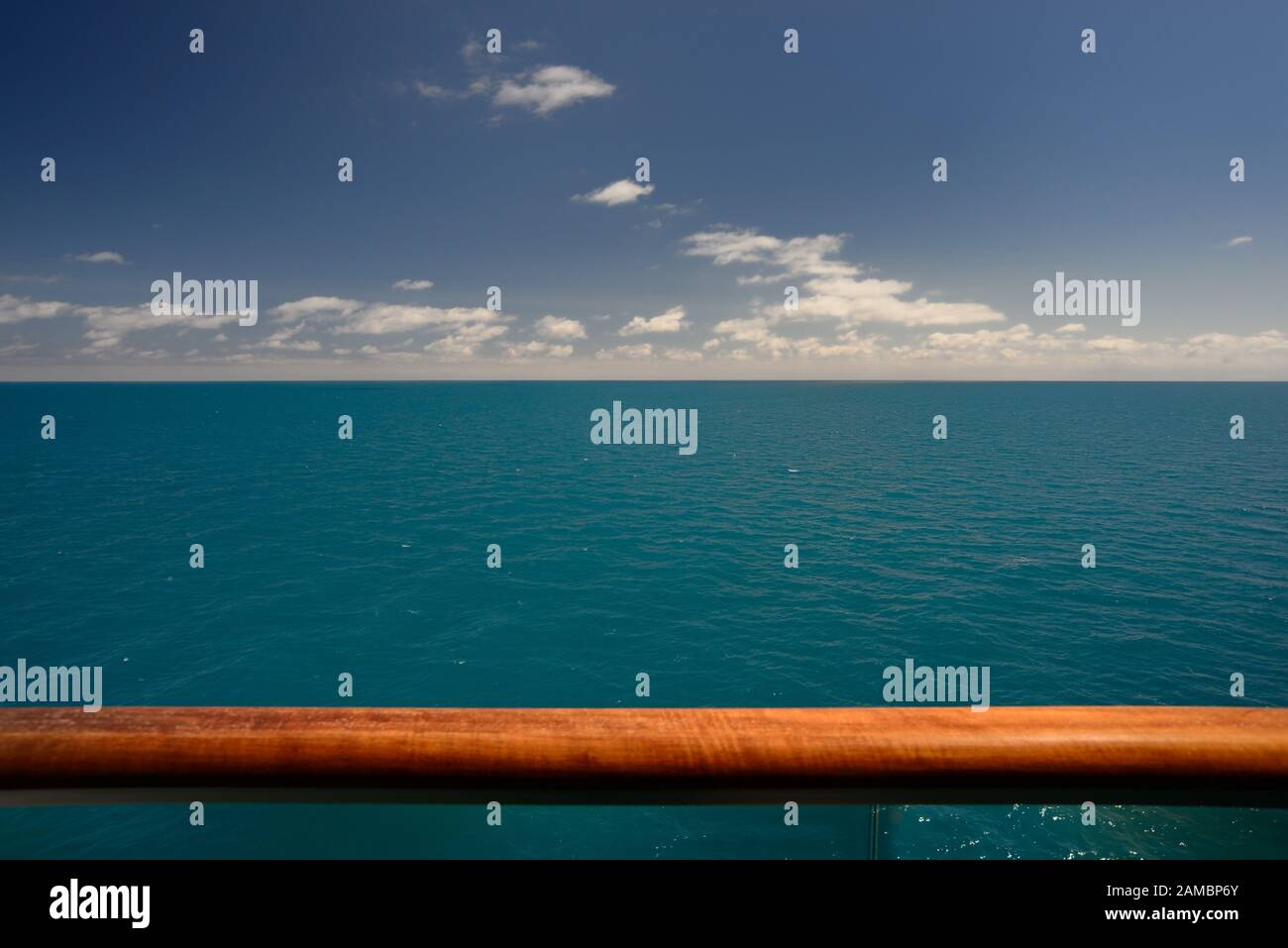 Blue sky, blue sea, and the handrail of a cruise ship Stock Photo - Alamy