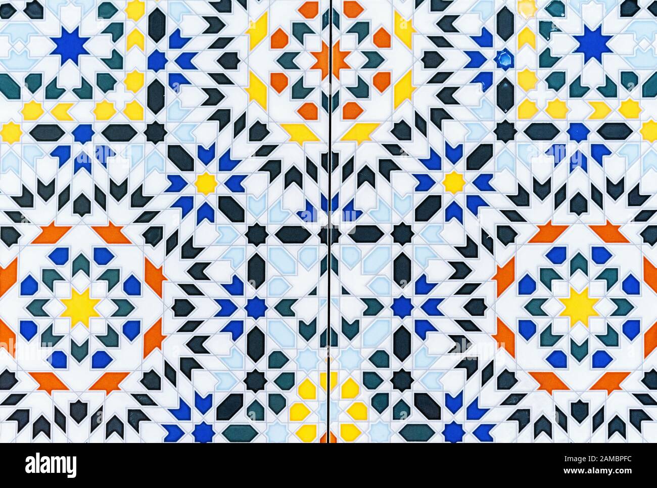Ceramic tiles with bright patterns. Porcelain tile with a multi-colored ...