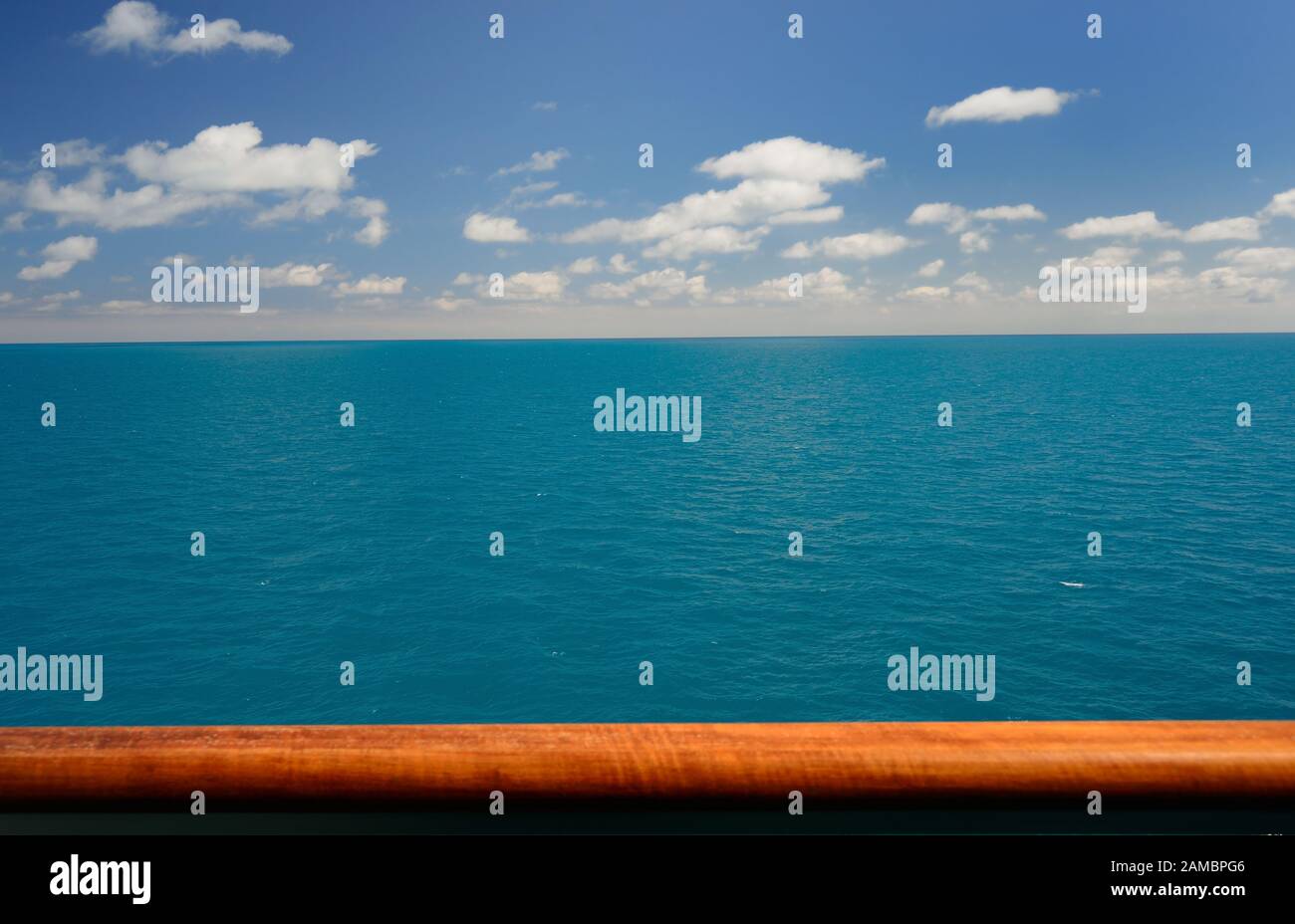 Blue sky, blue sea, and the handrail of a cruise ship Stock Photo - Alamy