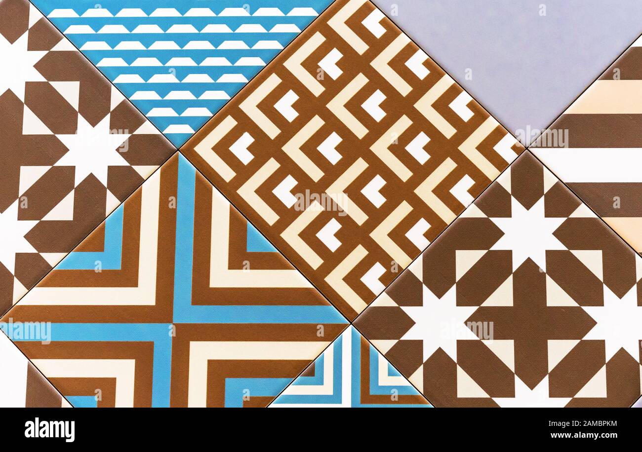 Ceramic tiles with bright patterns. Porcelain tile with a multi-colored ...