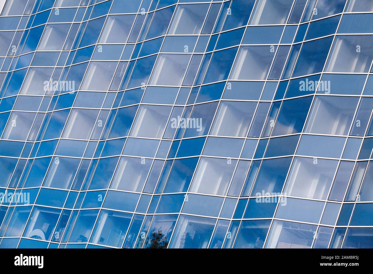 Beautiful architectural structures. Buildings of glass Windows ...