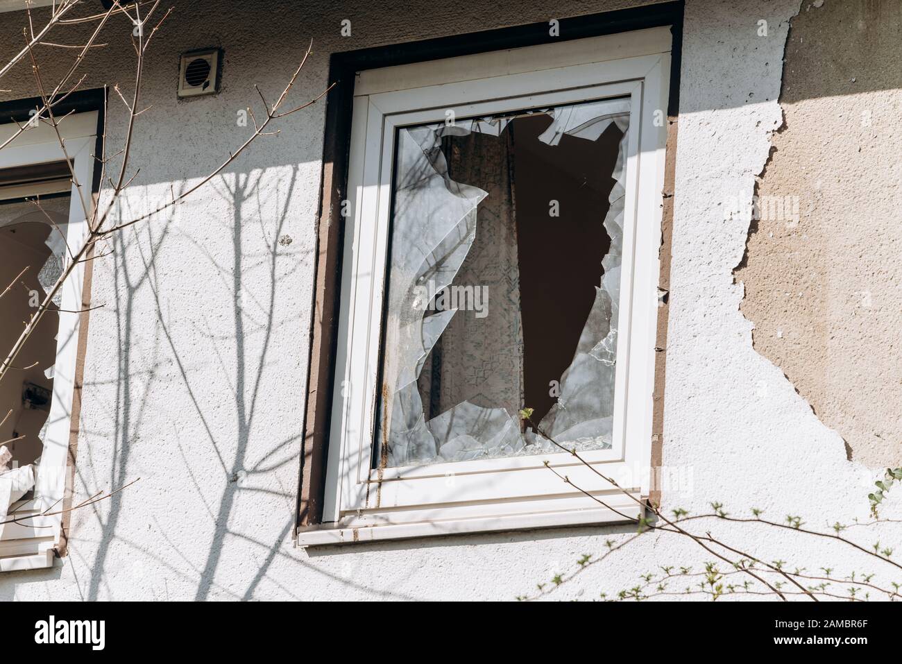 Broken Windows in the house. Shards of glass remained in the window ...