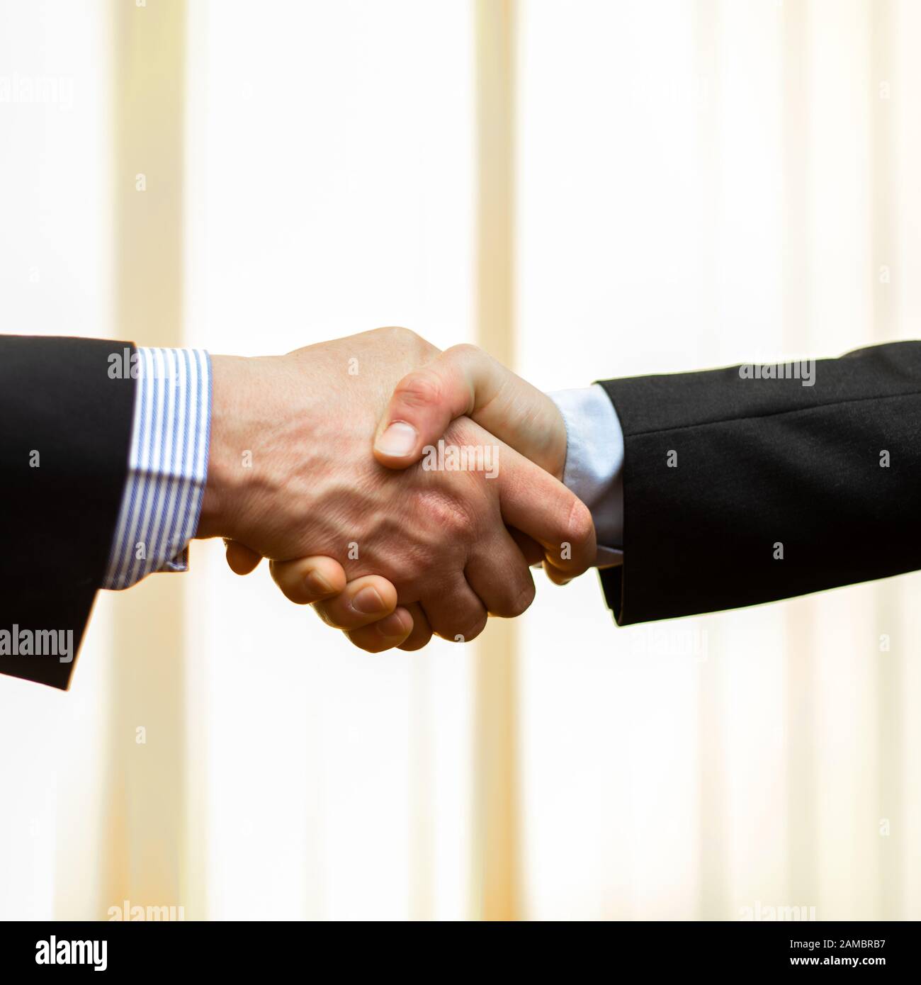 Firm Handshake High Resolution Stock Photography and Images - Alamy