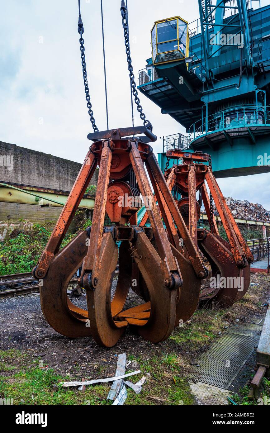 a crane on a junkyard Stock Photo - Alamy