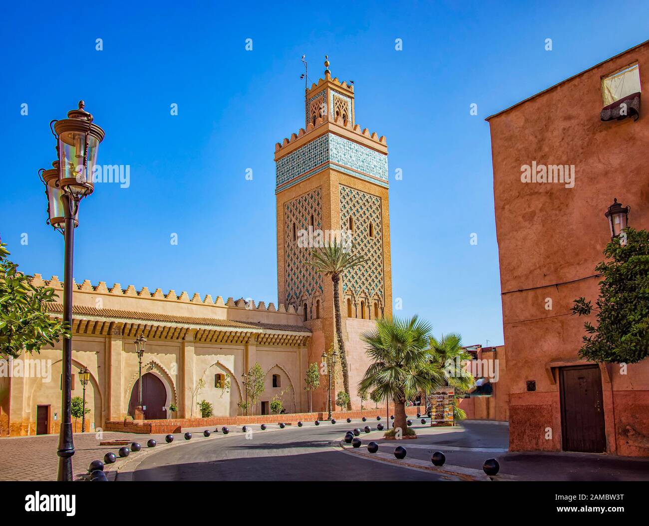 Tower of mosque minaret at medina quarter of Marrakesh, Morocco. There ...