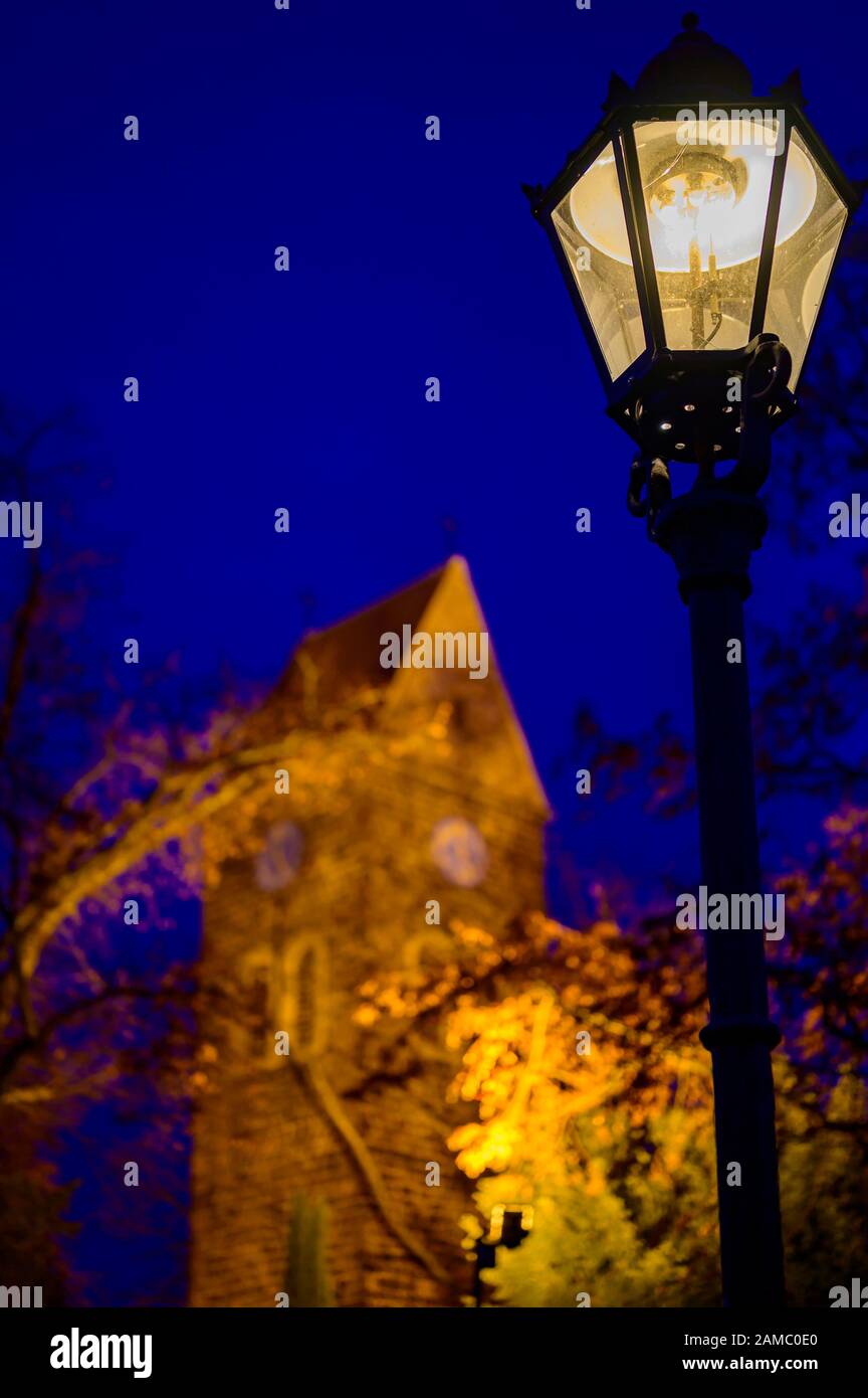 On the right side you can see a historic lantern. In the unfocussed ...