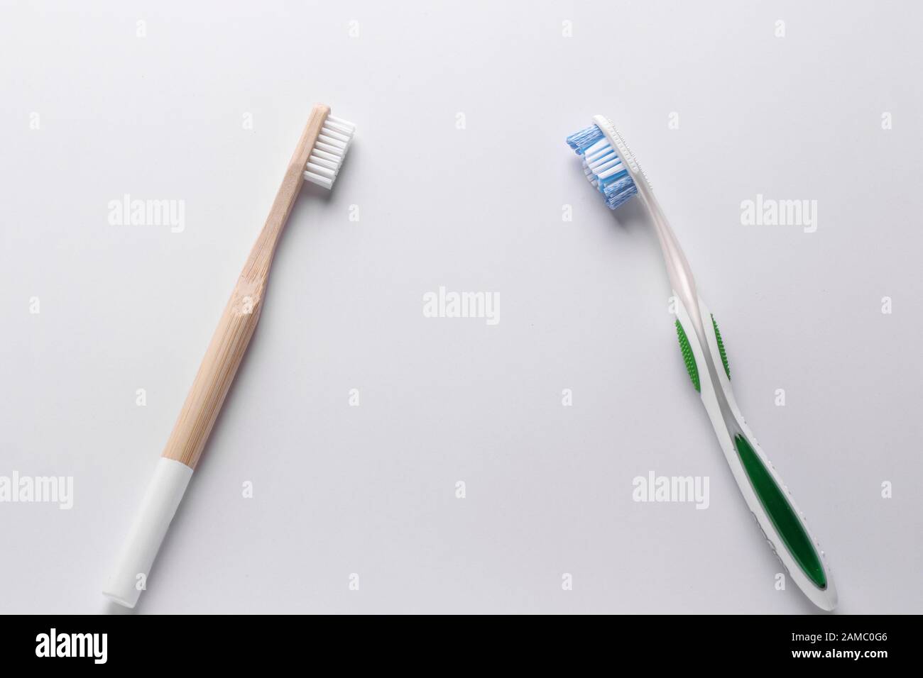 Zero waste concept, Eco wooden toothbrush vs plastic toothbrush on ...