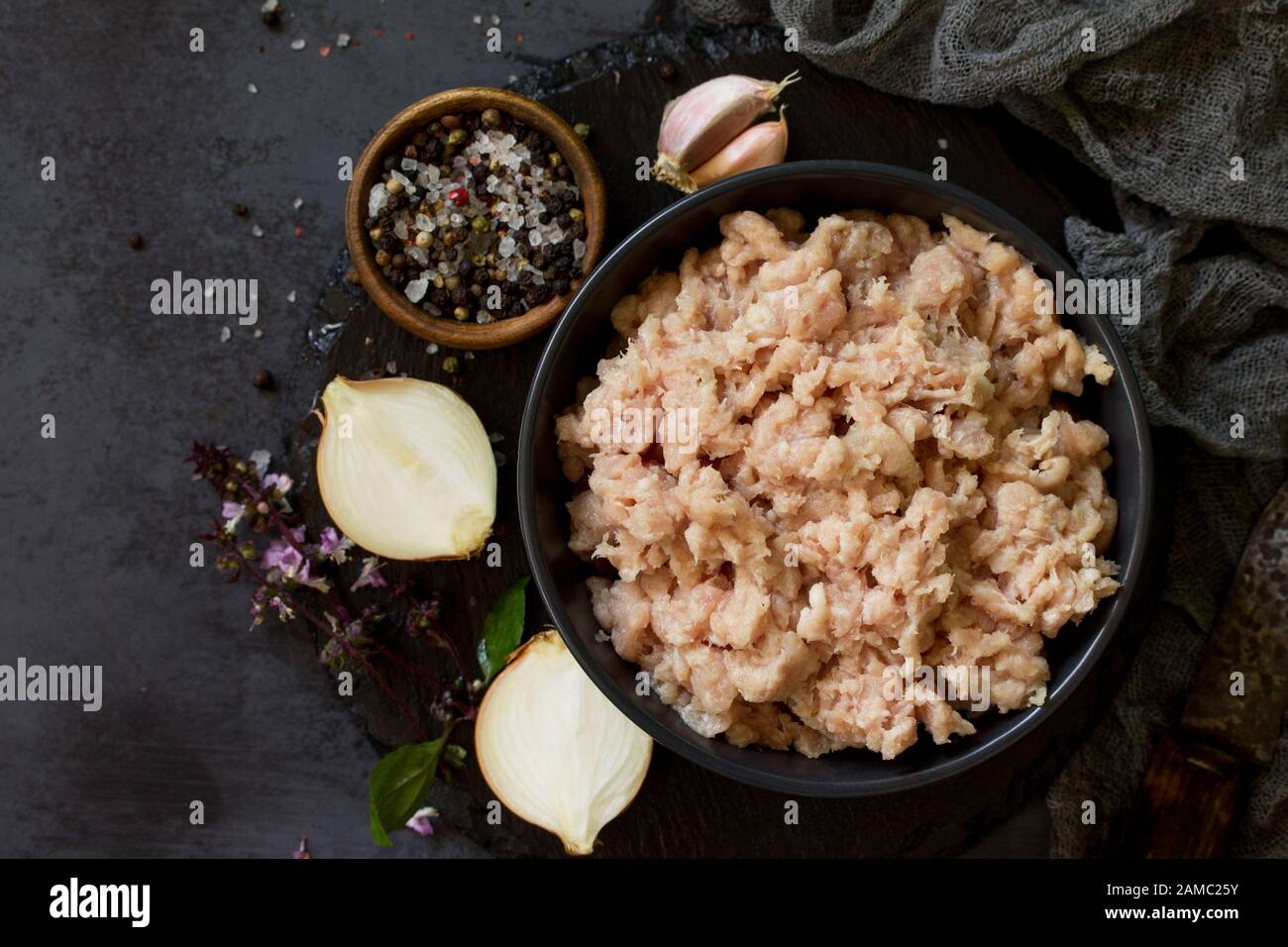 Minced meat and ingredients for cooking minced meat in a bowl on a ...