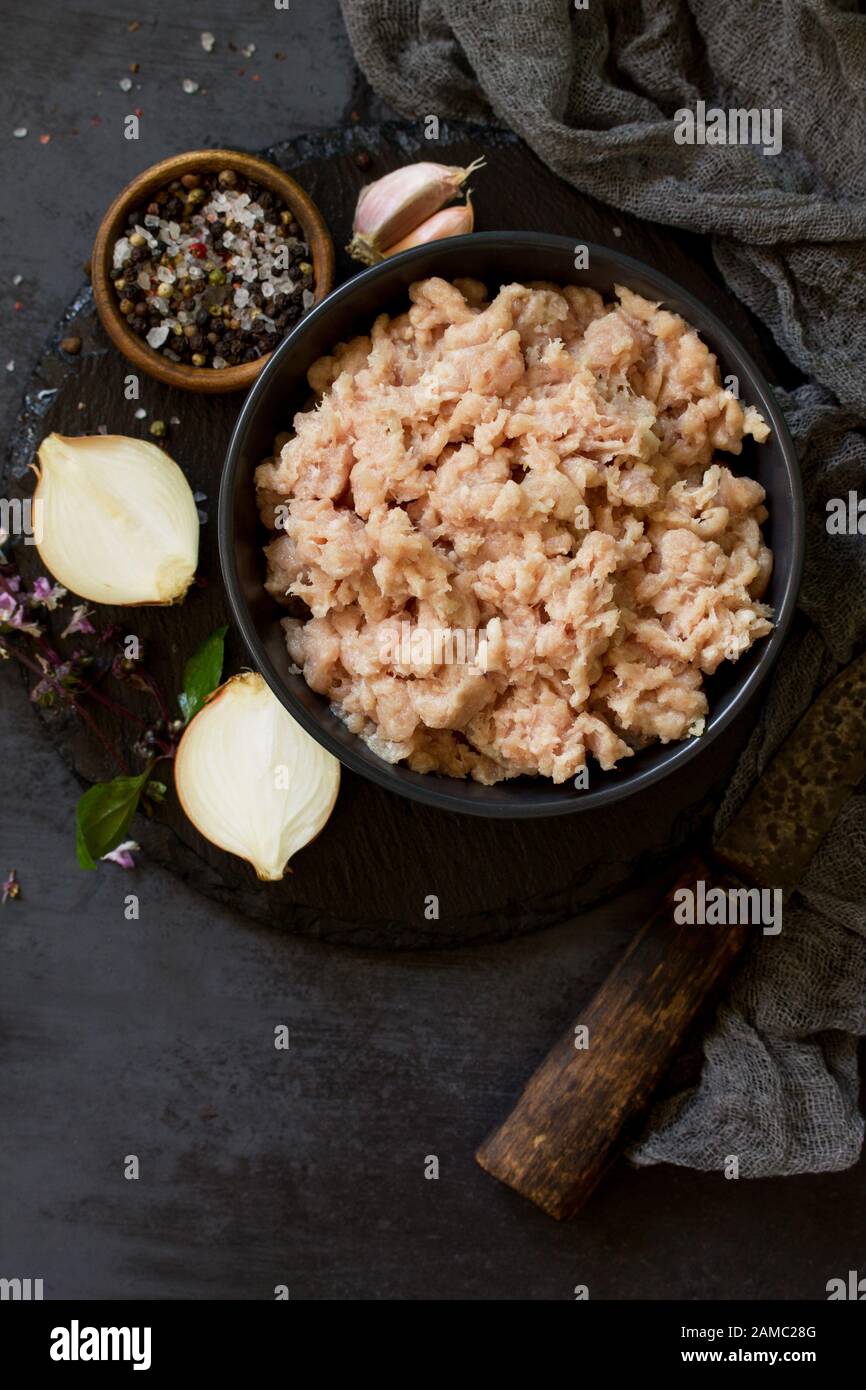 Minced meat and ingredients for cooking minced meat in a bowl on a ...