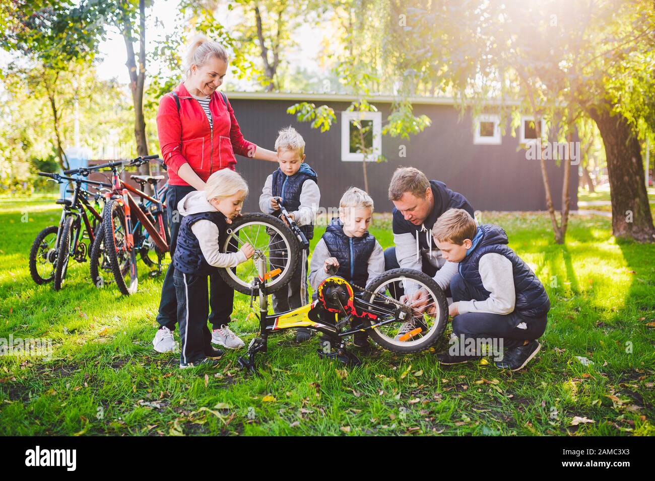 The theme of teamwork and friendly family. Outdoor activities. Parents ...