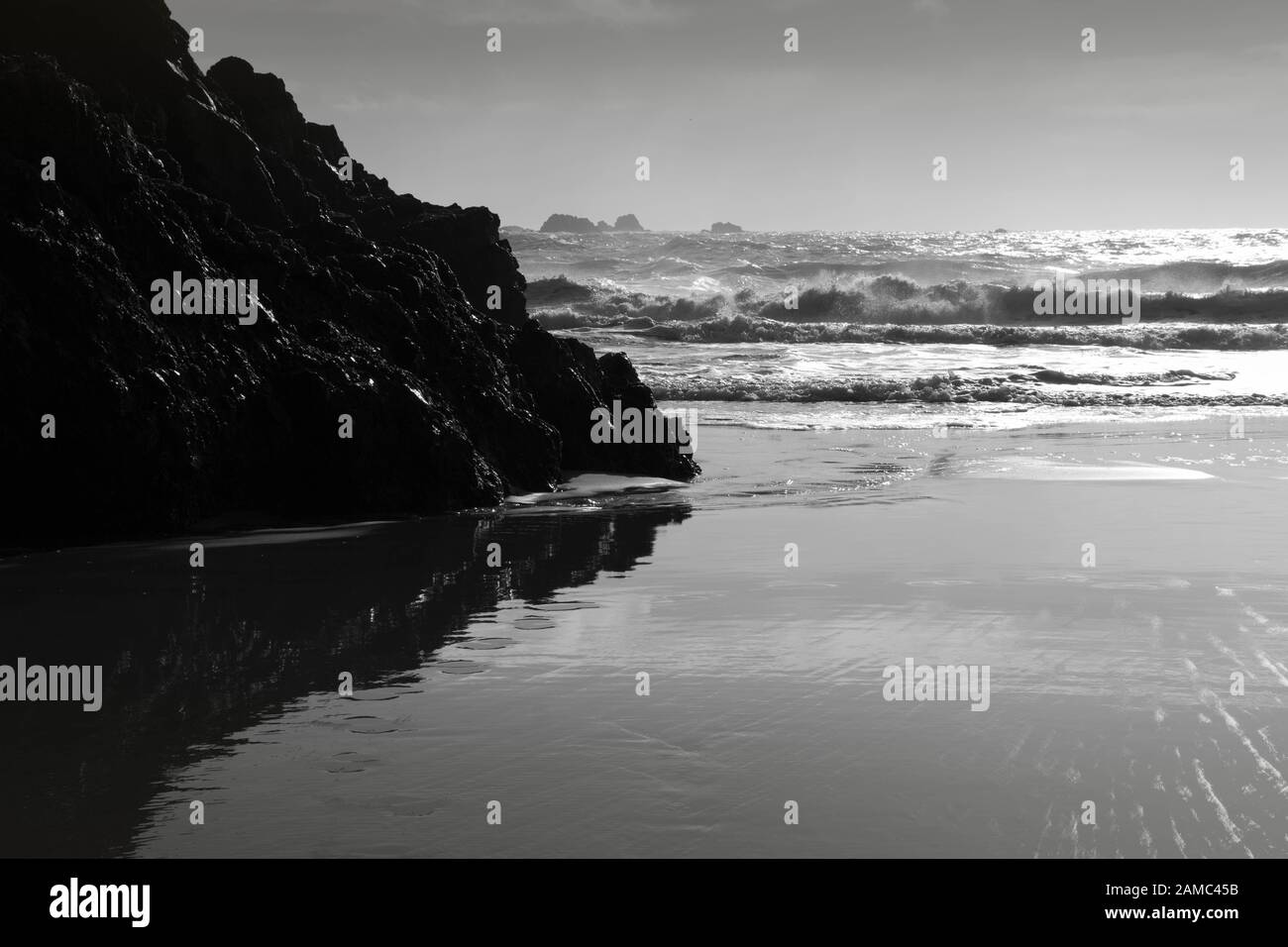 Dark black coastal rocks hi-res stock photography and images - Alamy