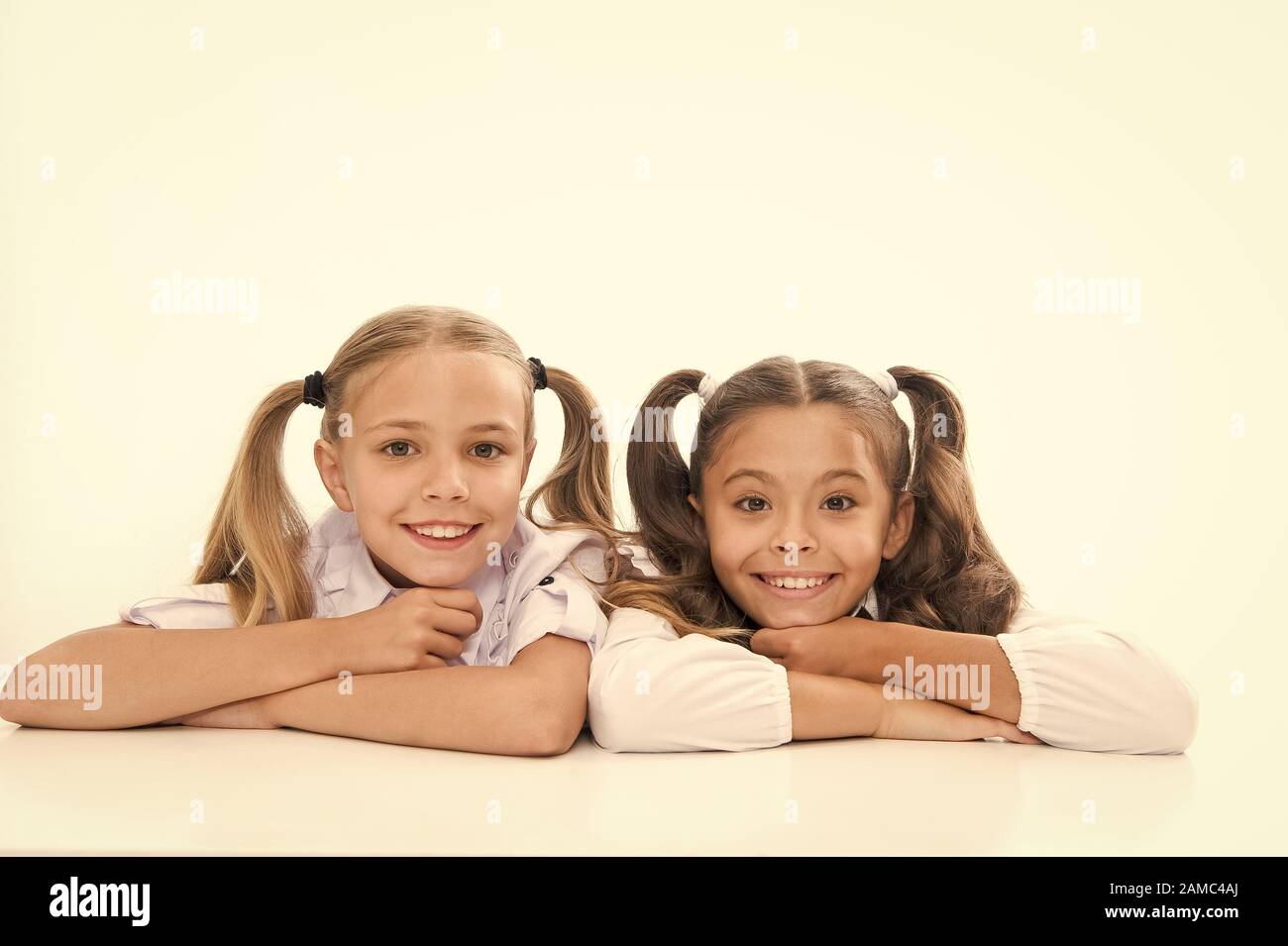 Beautiful and smart. School girls in pigtails. Cute little girls ...