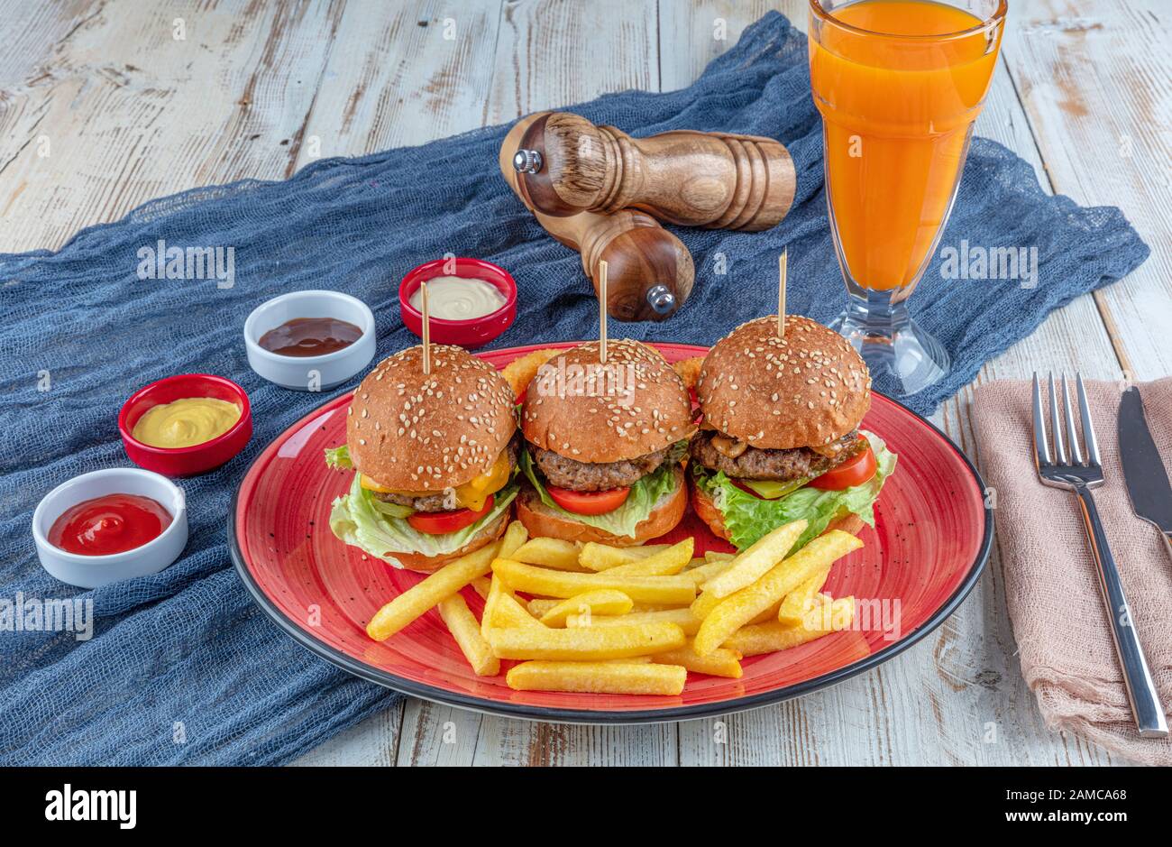 Three mini hamburger. Homemade delicious three mini burgers served with ...